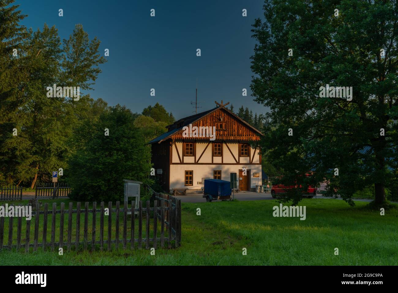 Color morning in Stozec village with house near forest in national park ...