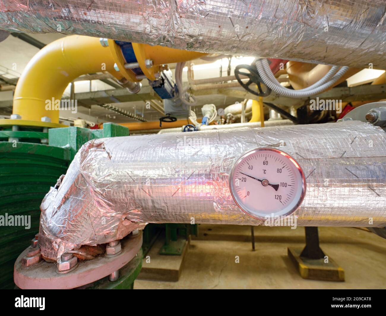 Manometers and valves with heating pipelines in boiler room, heat ...