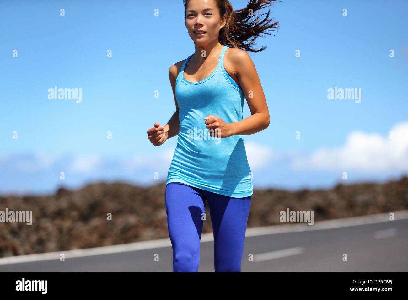 Cardio running sport woman runner jogging outside doing weight loss ...
