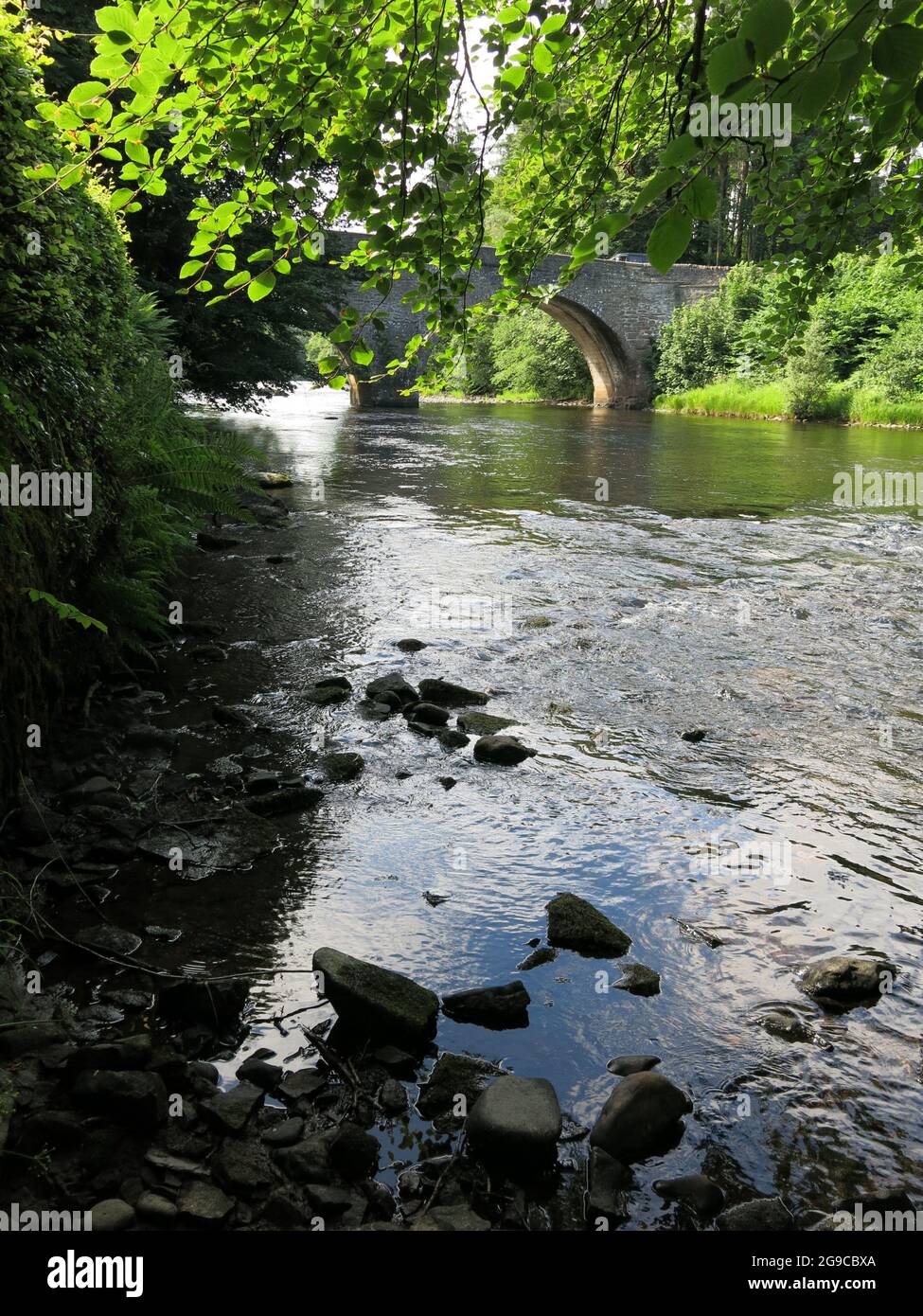 View along the River Teith towards the twin arched bridge that was ...