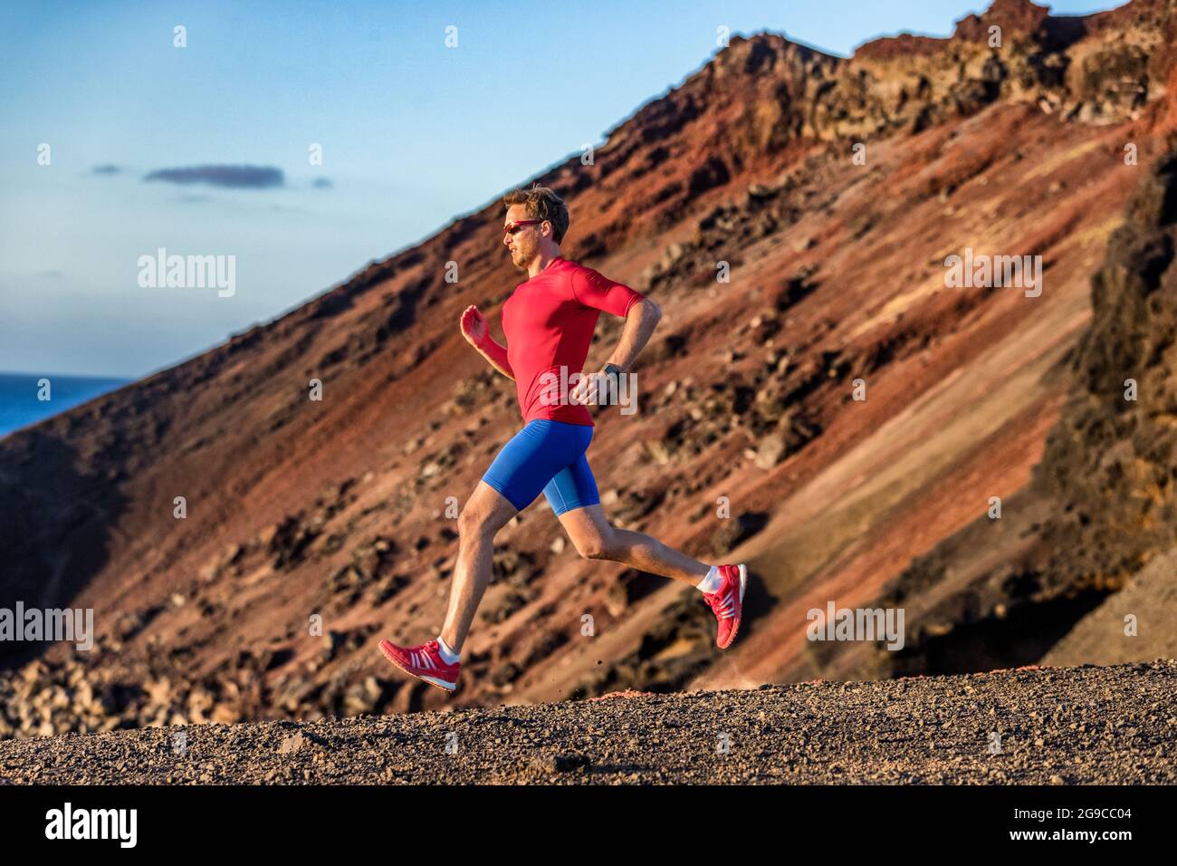 Trail run. Sport athlete runner man running in mountain nature ...