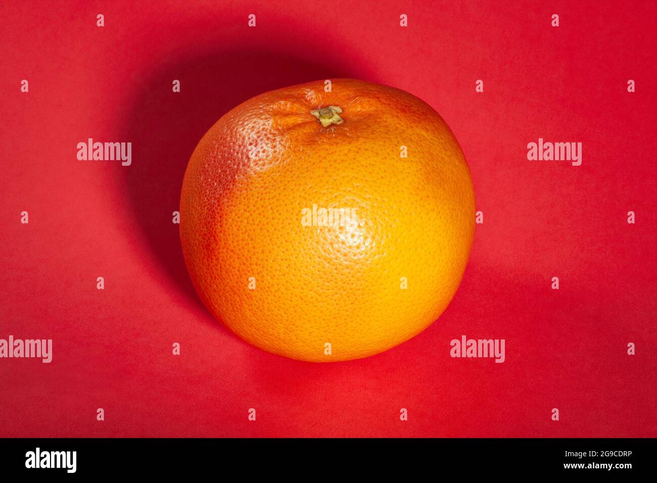 Single red fruit hi-res stock photography and images - Alamy