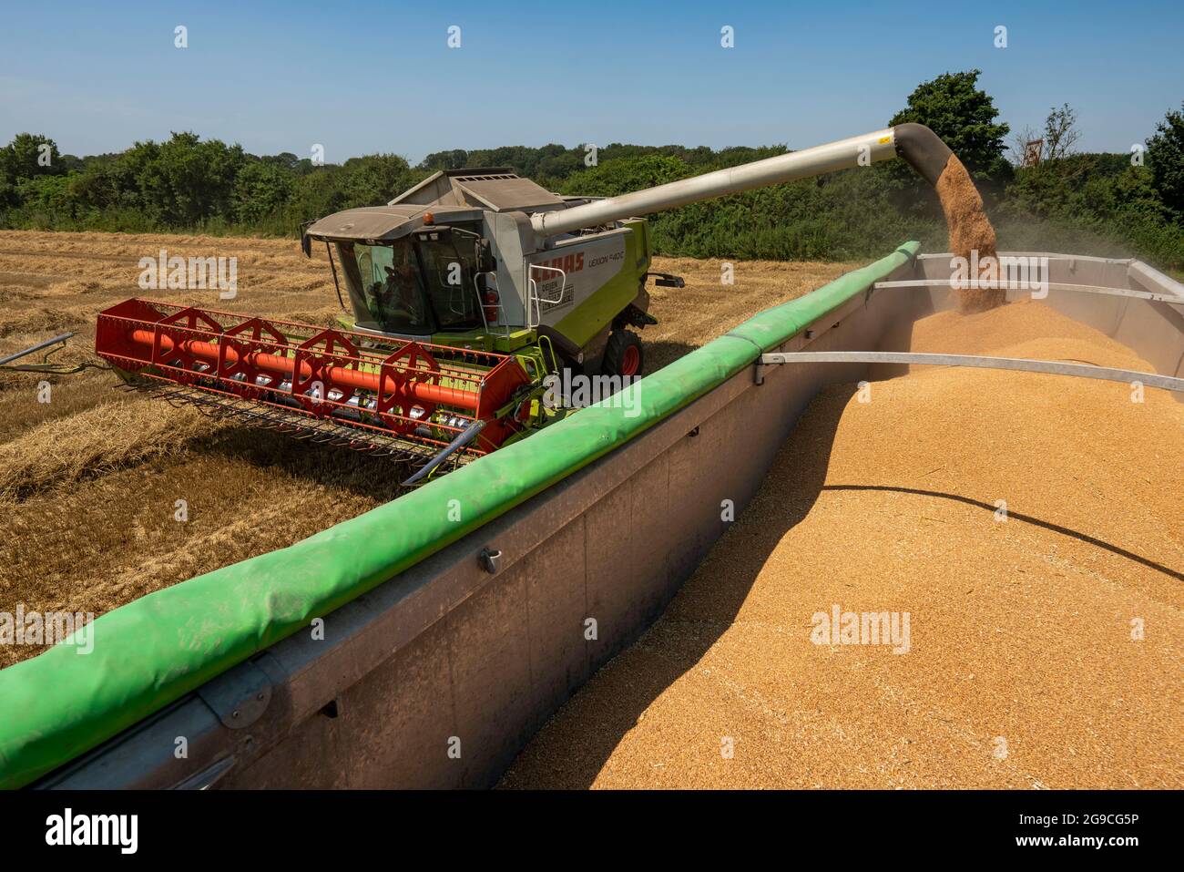Grain tank discharge combine harvester hi-res stock photography and ...
