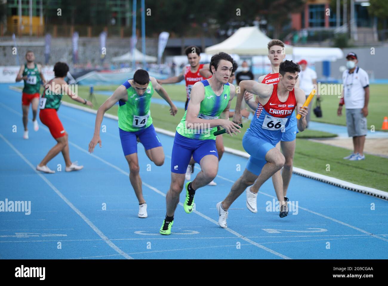 ISTANBUL, TURKEY - JUNE 13, 2021: Athletes running running 4x400 metres ...