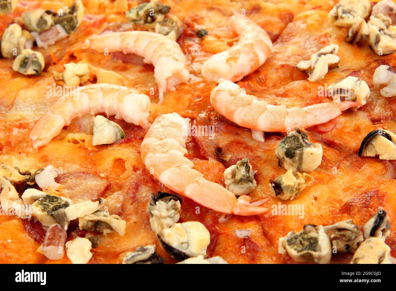 Delicious pizza with seafood close-up Stock Photo - Alamy