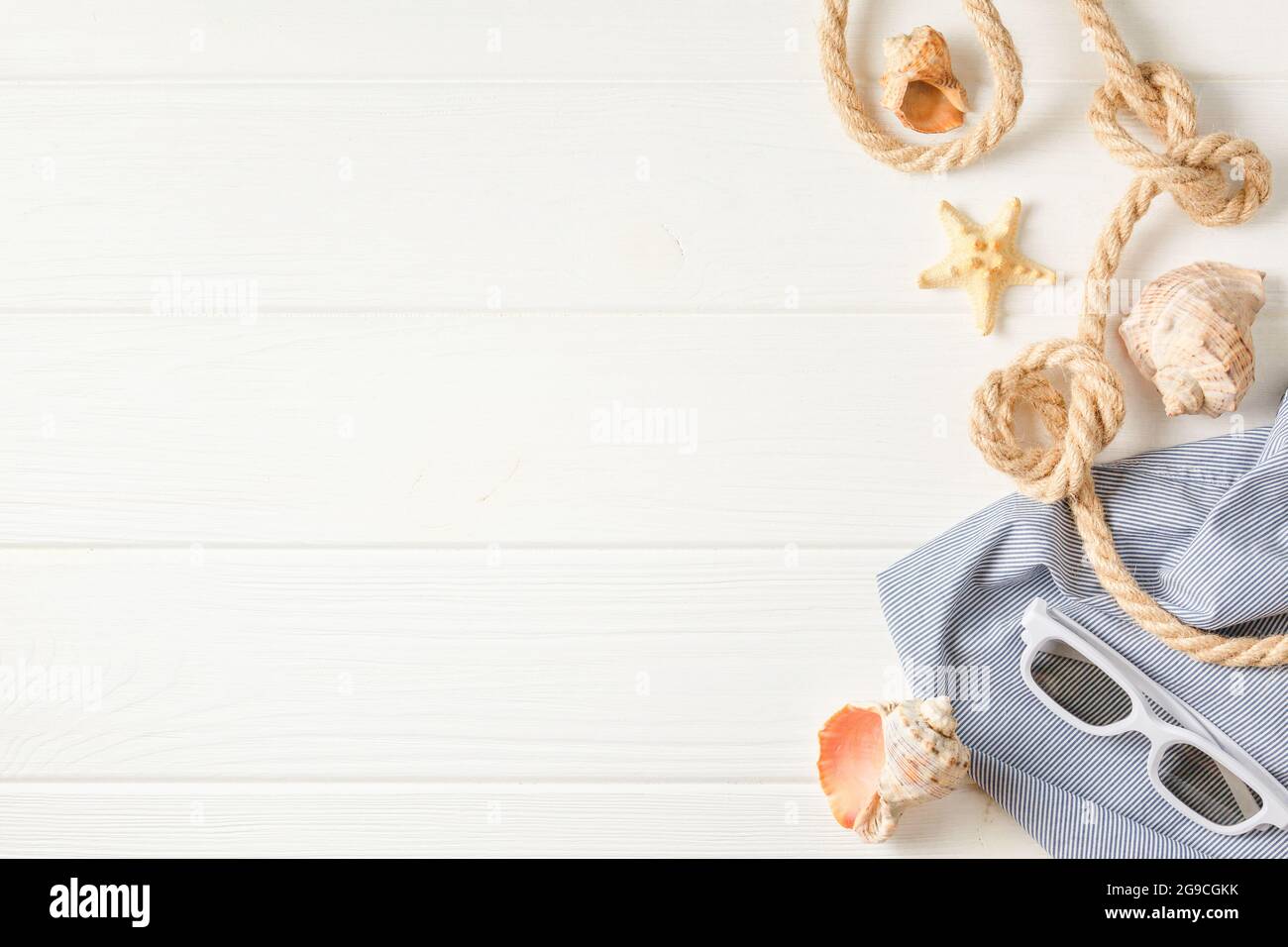 Wooden desk with clam shell concept Stock Photo - Alamy