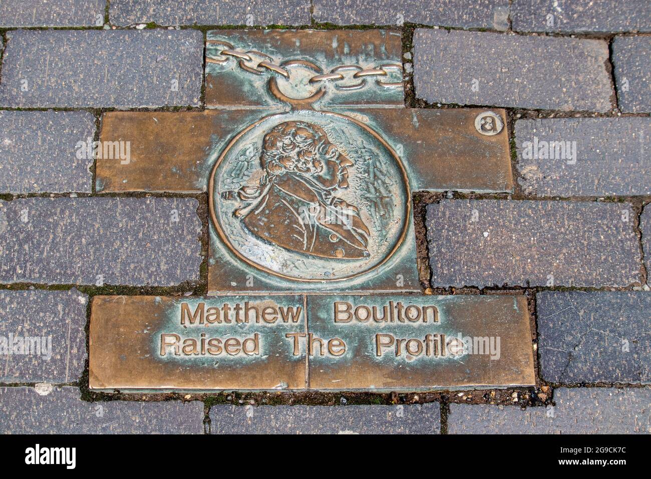 A plaque to Matthew Boulton in amongst the paving bricks in Newhall ...