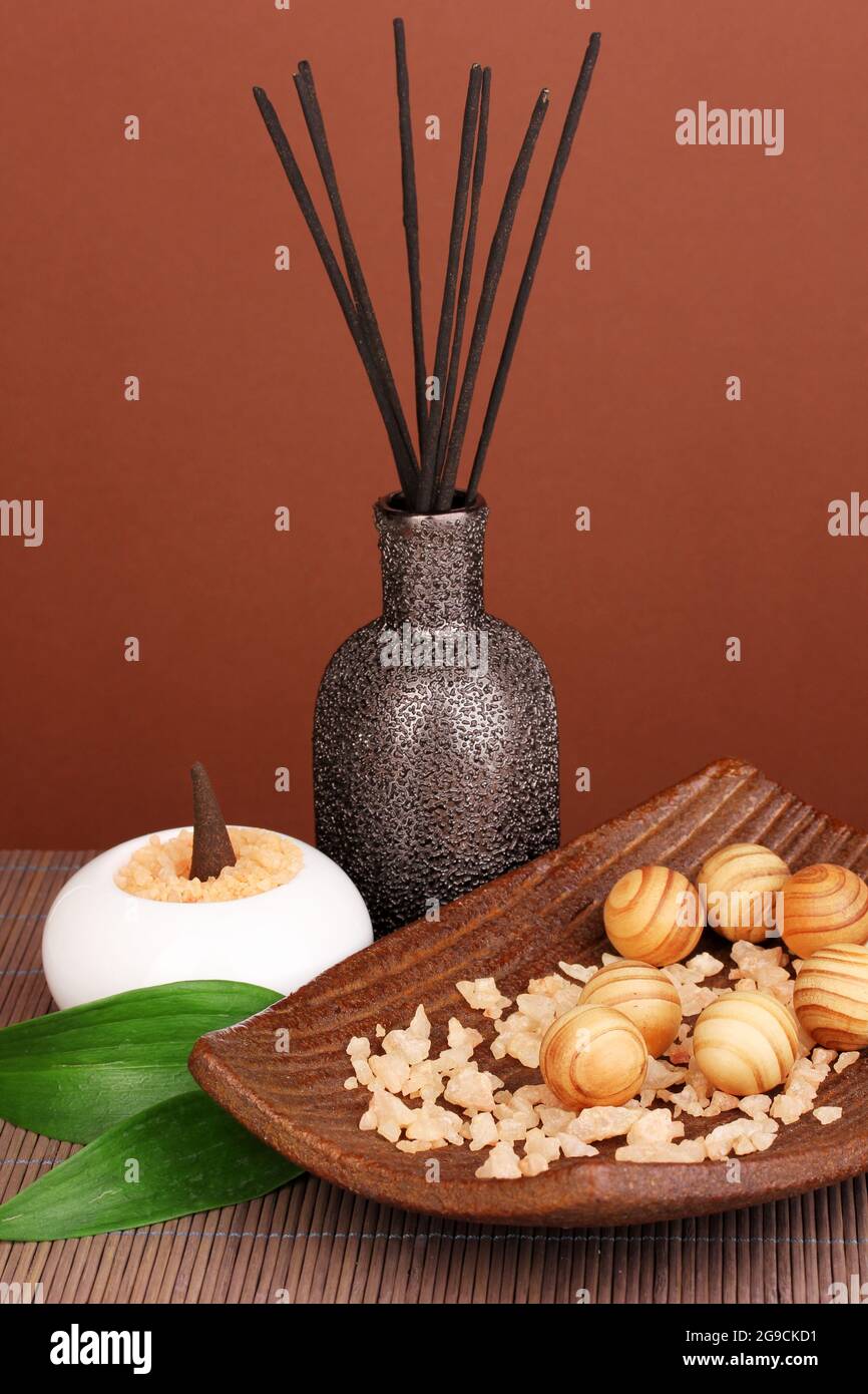 aromatherapy setting on brown background Stock Photo - Alamy