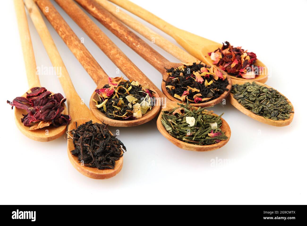 assortment of dry tea in spoons, isolated on white Stock Photo - Alamy