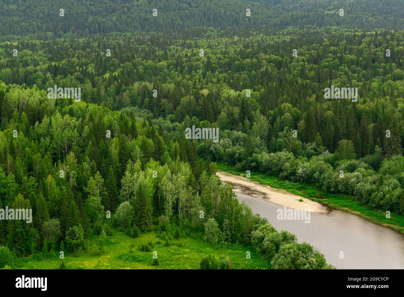 top view of a wild wooded river valley among the hills Stock Photo - Alamy