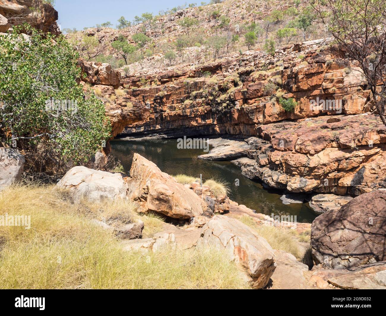 The sandstone cliffs of Bell Gorge make a popular swimming hole along ...
