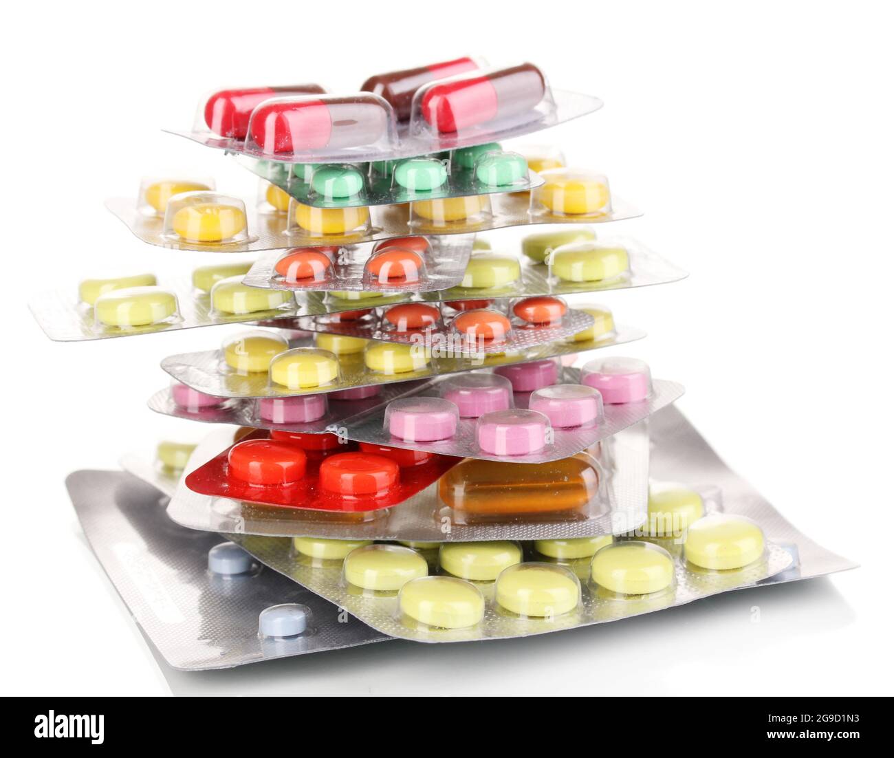 Capsules and pills packed in blisters isolated on white close-up Stock ...
