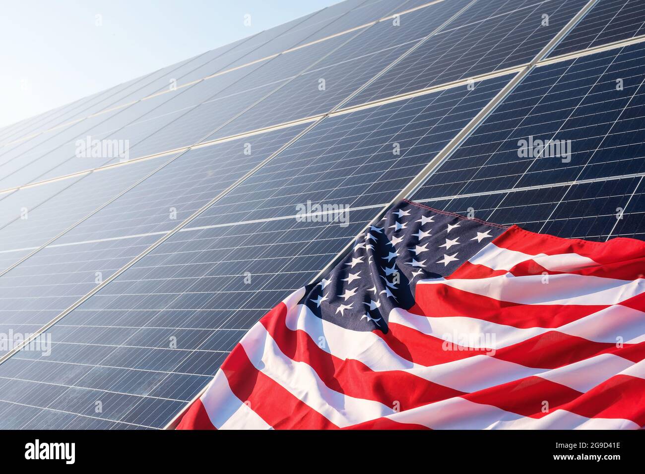 American flag close up on solar panels on solar power plant Stock Photo ...