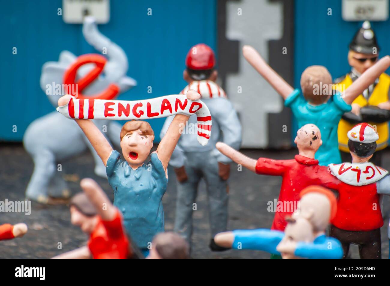 Closeup of tiny model England figurines celebrating football match ...