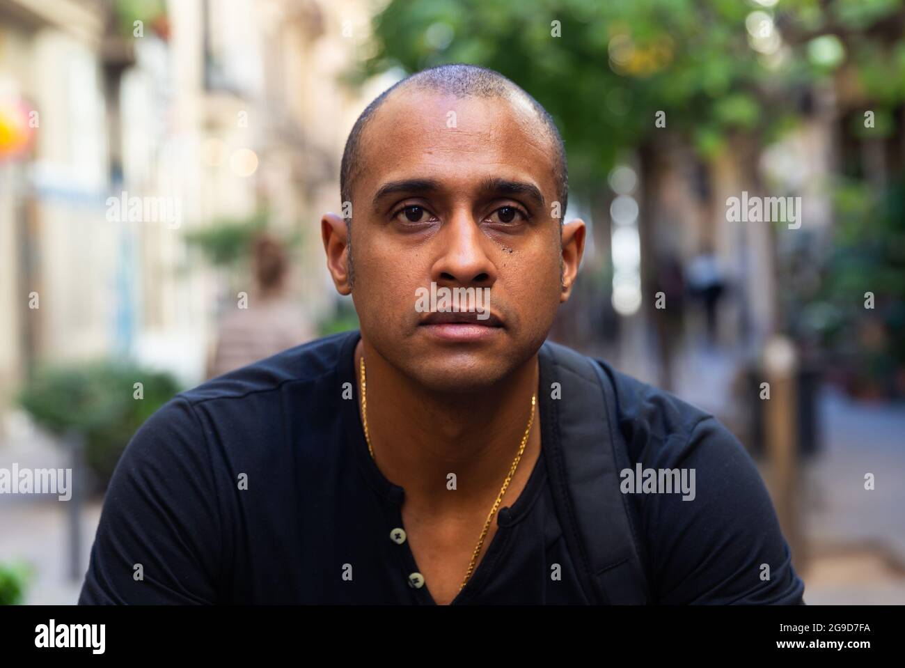 Bald latino man hi-res stock photography and images - Alamy