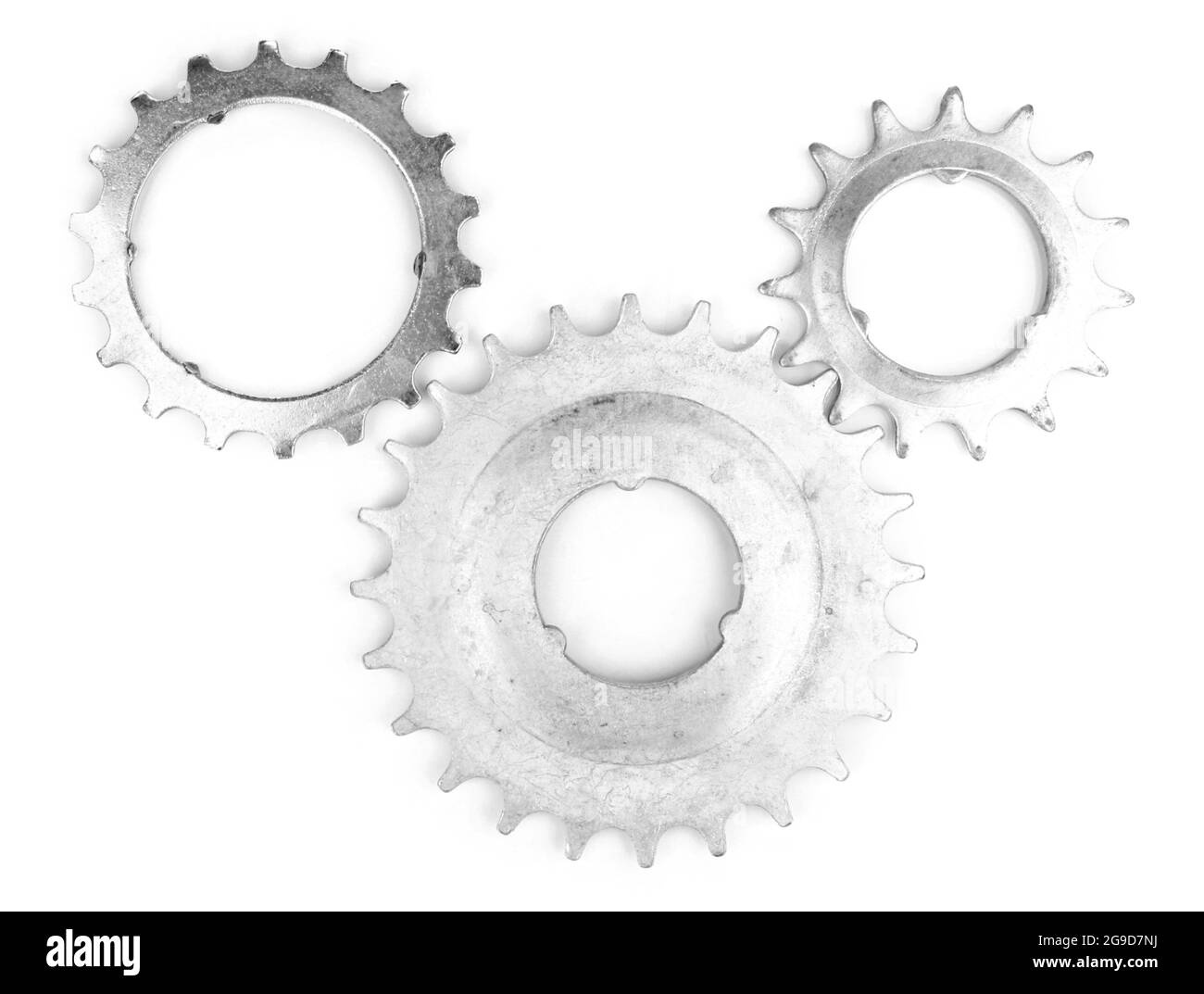 Metal cogwheels isolated on white Stock Photo - Alamy