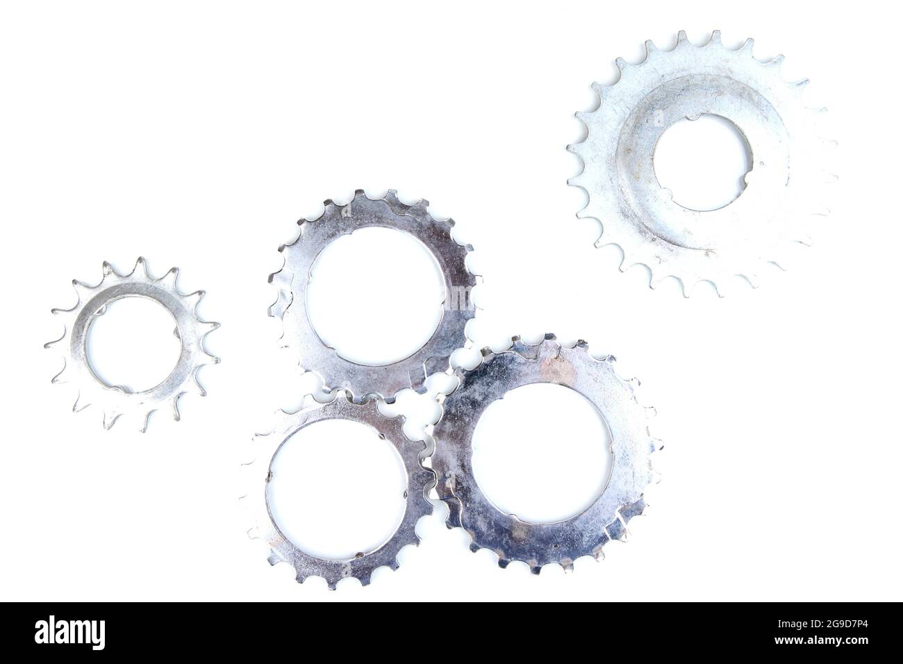 Metal cogwheels isolated on white Stock Photo - Alamy