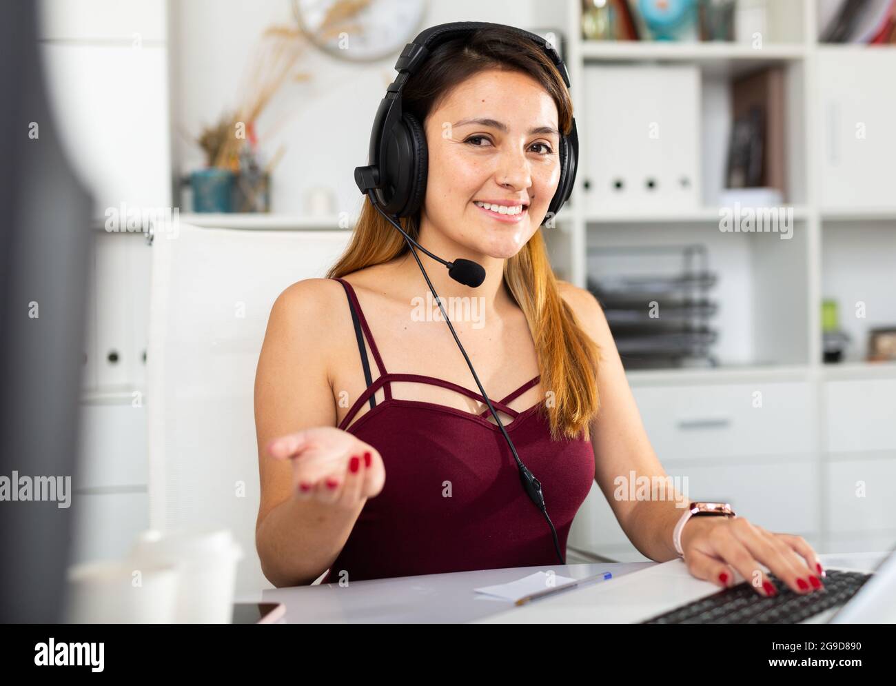 Woman helpline operator at work Stock Photo - Alamy