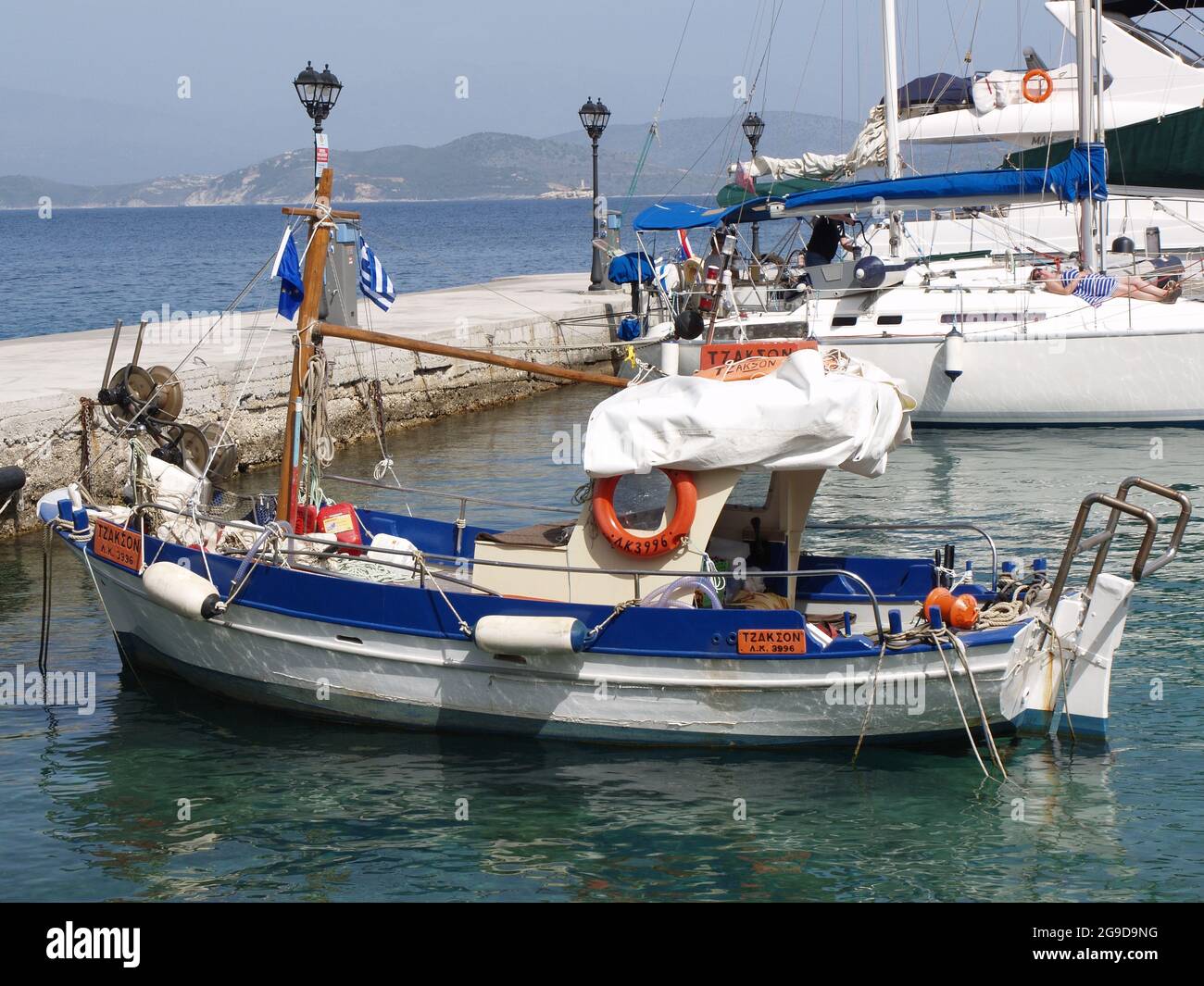 Fishing boat at Kassiopi Harbour, Corfu, Greece Stock Photo - Alamy