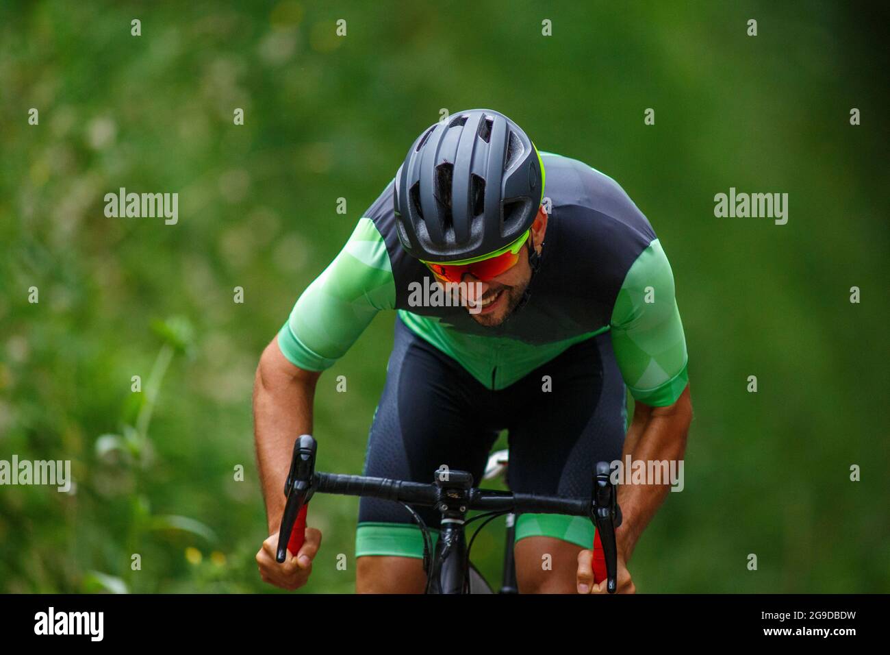 Cyclist on road bike, athlete on bike in race Stock Photo - Alamy