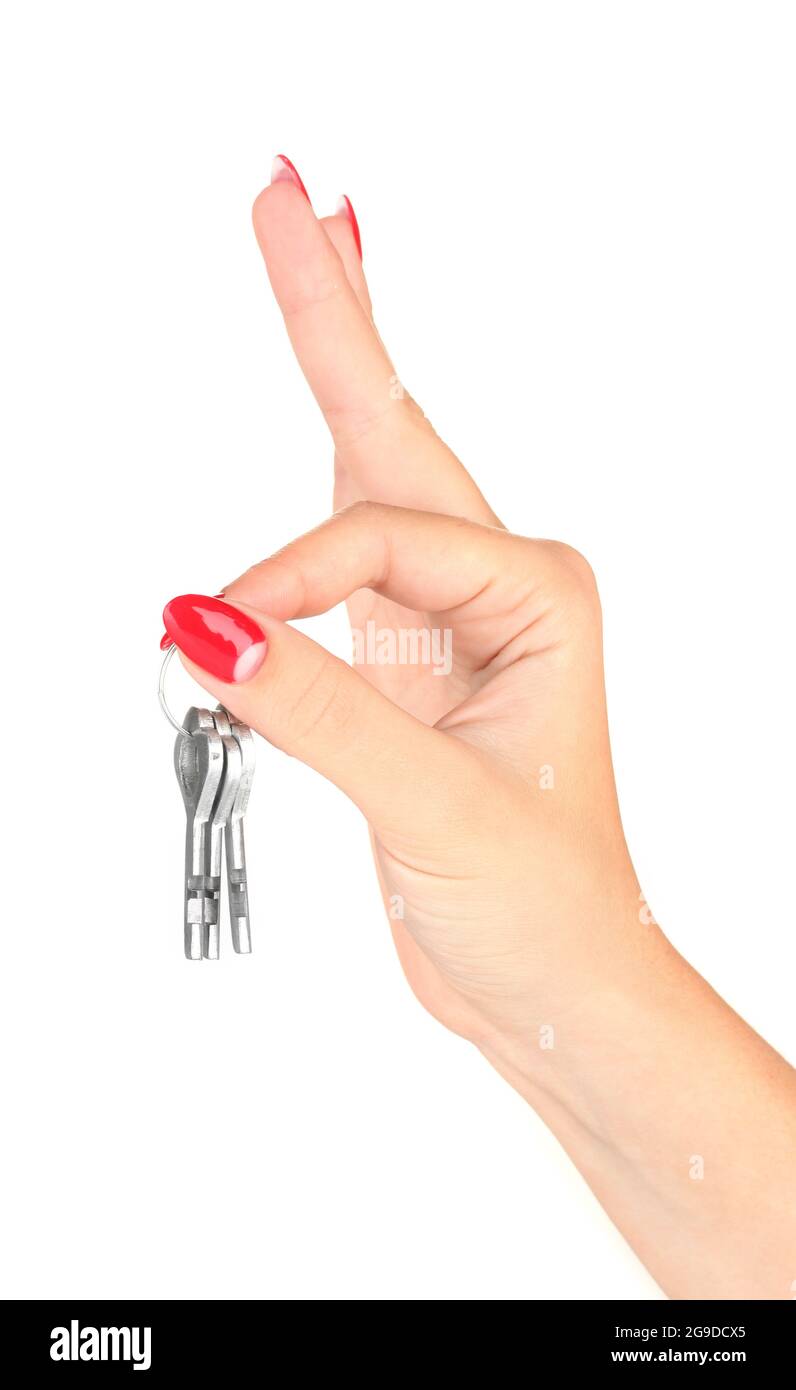Hand with keys isolated on white Stock Photo - Alamy