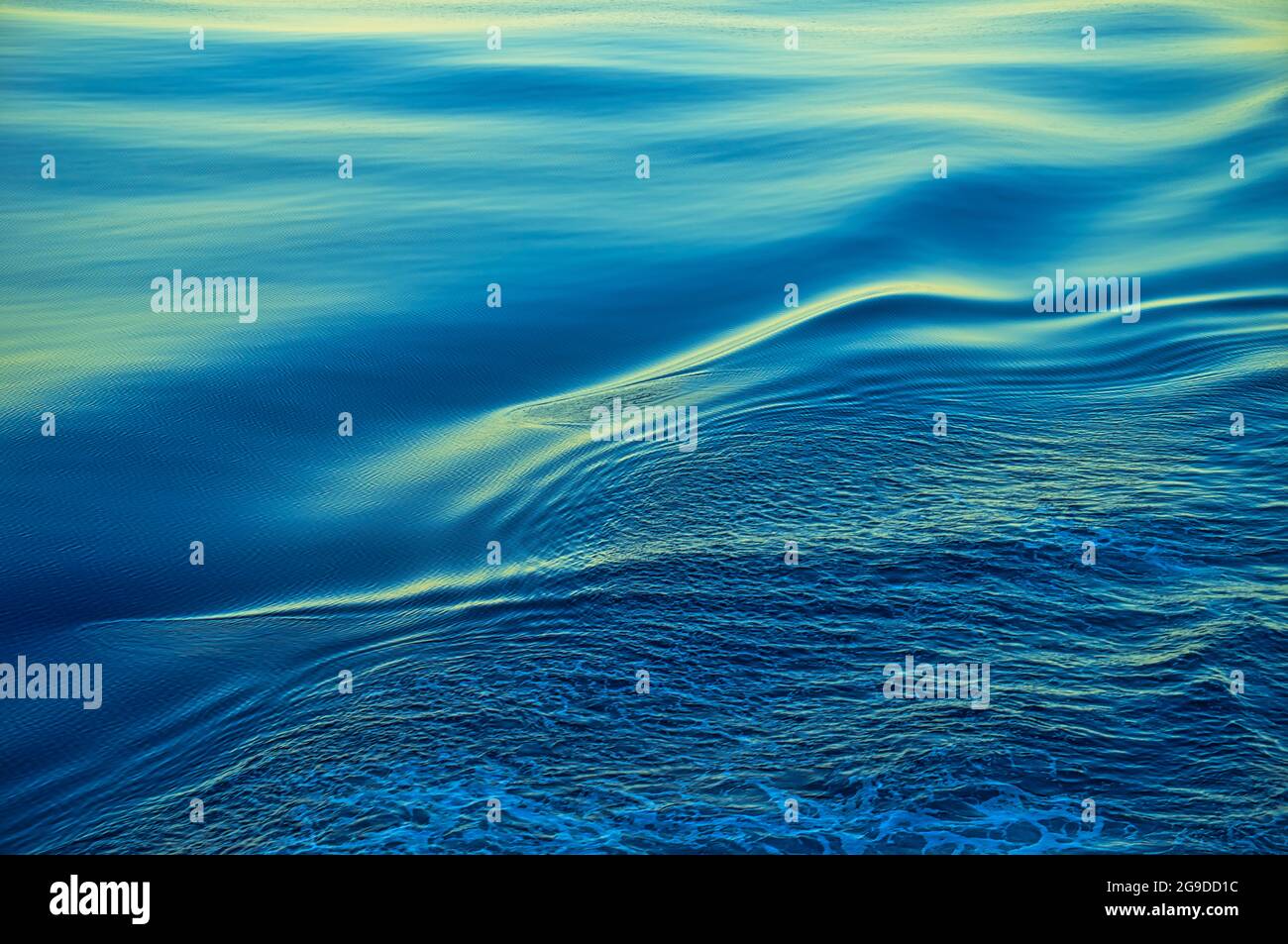 The sea level moves smoothly to create layers of ripples. Nature is ...