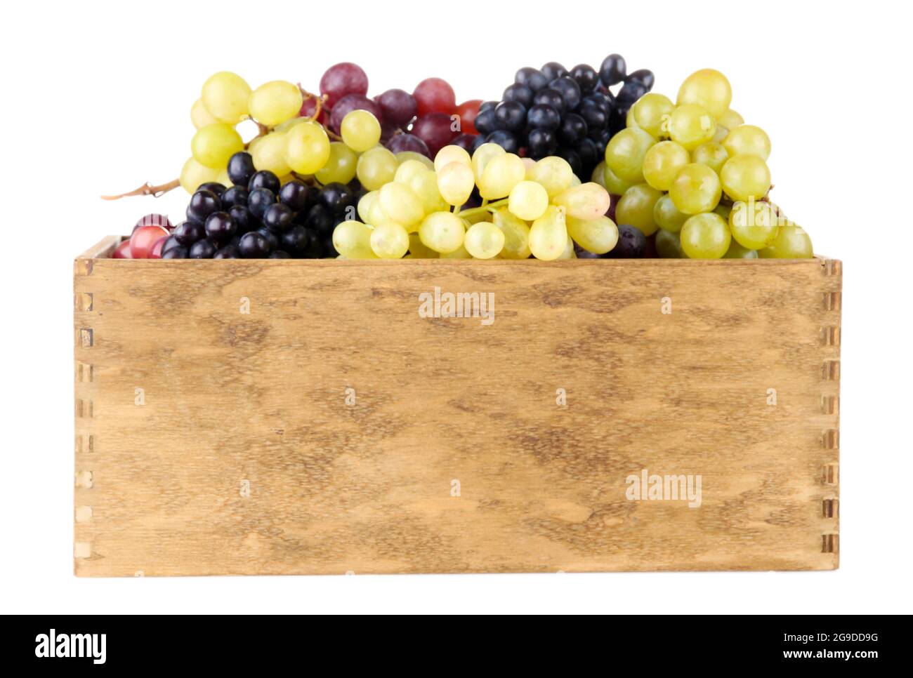 assortment of ripe sweet grapes in wooden crate, isolated on white ...