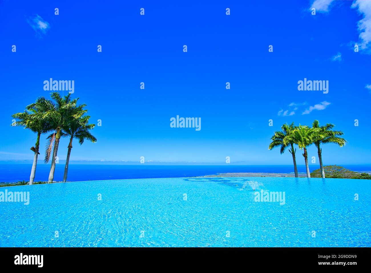 Tropical blue sea, blue sky and green palm trees. Relaxing vacation ...