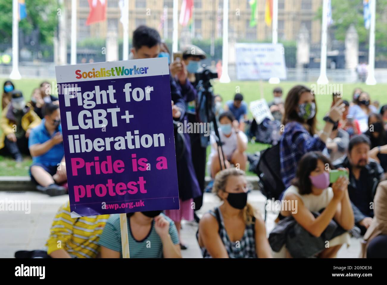 A protest placard is planted in Parliament Square for the Reclaim Pride ...