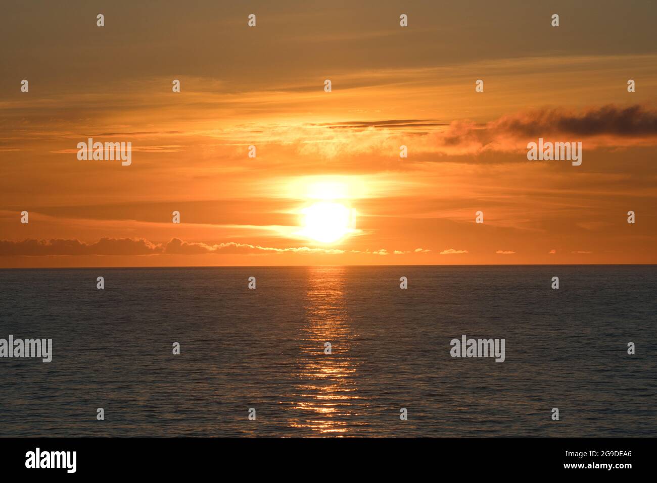 Sunset over the Canadian Gorge. The orange shimmer of the sea. View ...
