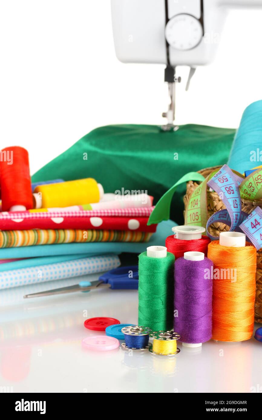 sewing machine and fabric isolated on white Stock Photo - Alamy