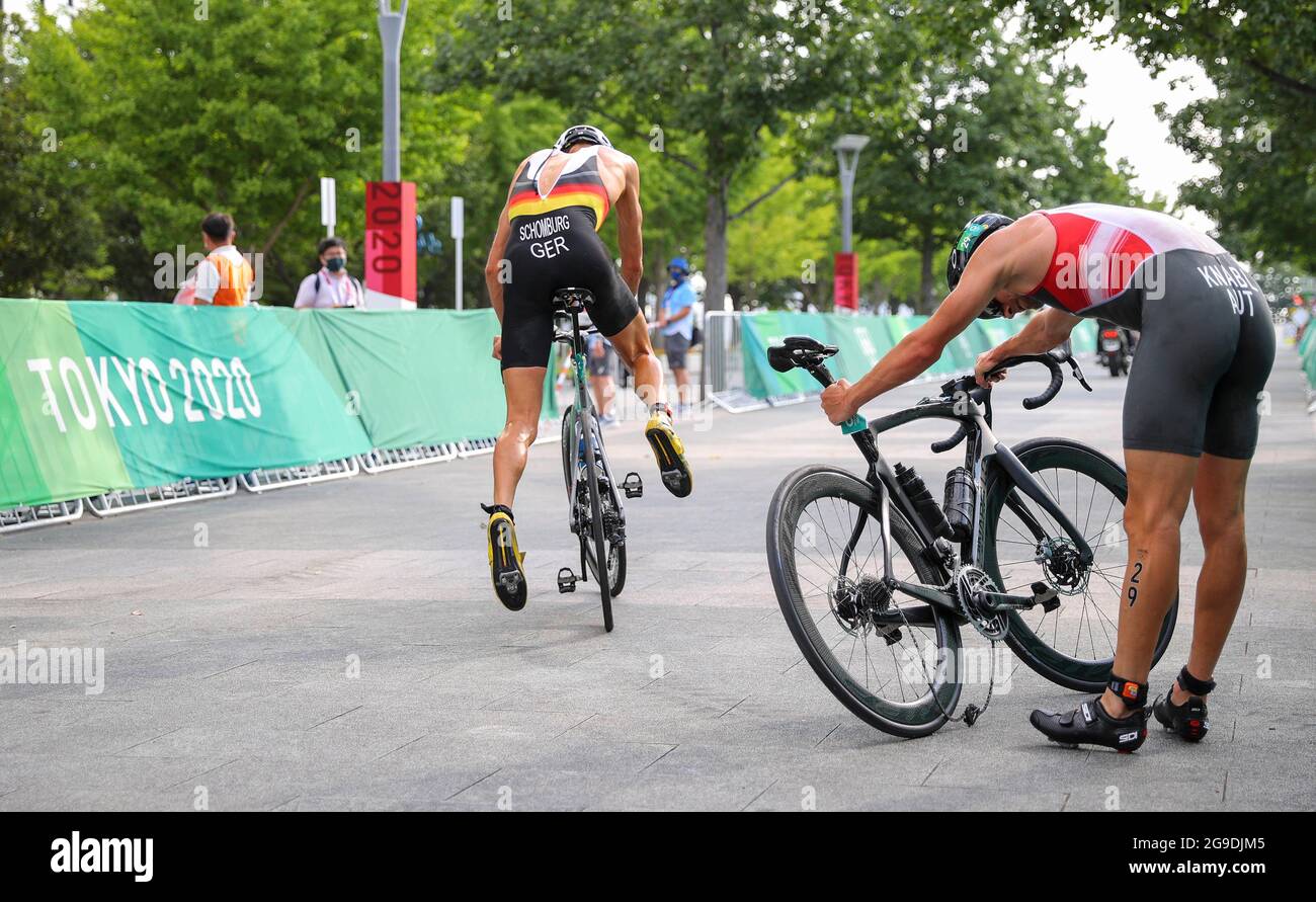 Tokyo, Japan. 26th July, 2021. Alois Knabl (R) of Austria checks his ...