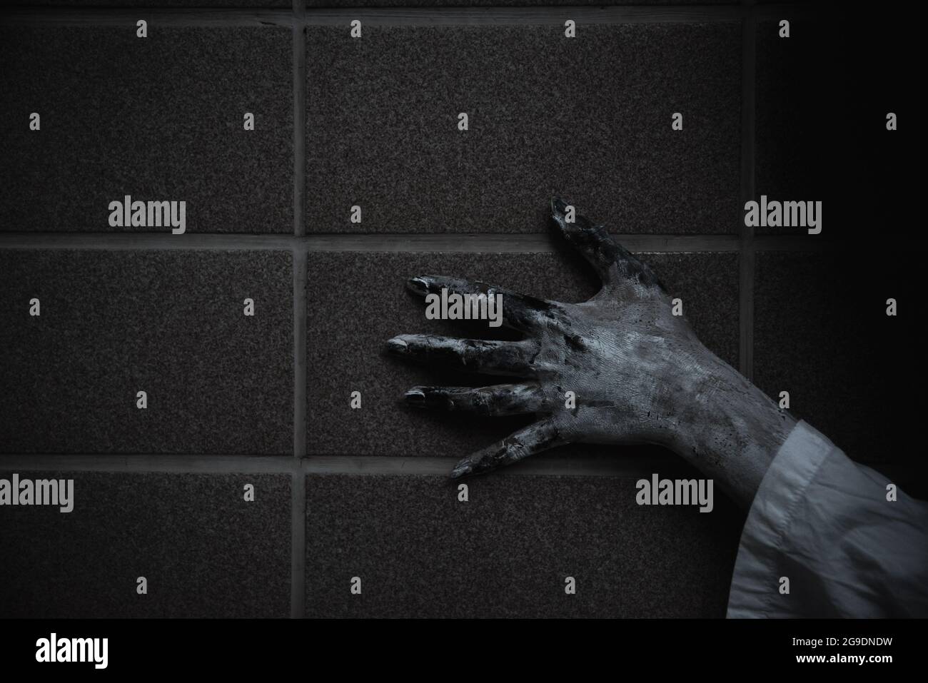 Hand of woman ghost creepy touch on wall have copy space for background ...