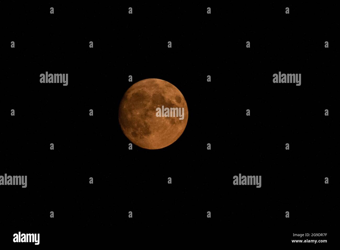A view of the Buck Moon from Saundersfoot, Wales on the 22nd July 2021 ...