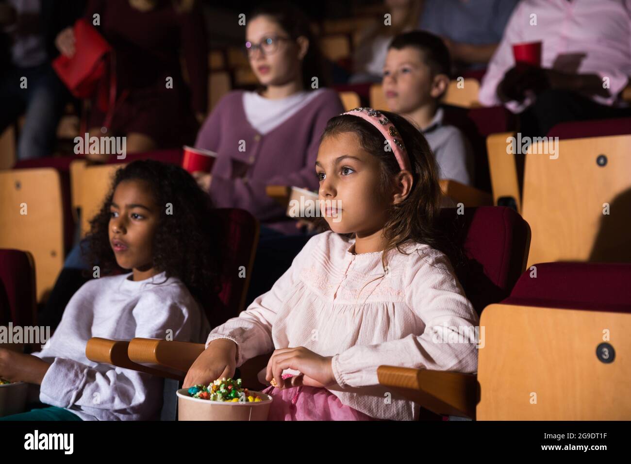 Watching intently a show hi-res stock photography and images - Alamy