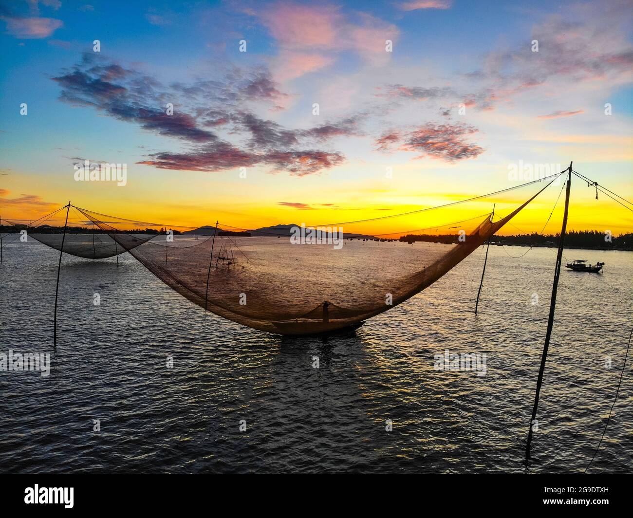 Colorful fishing net in Cua Dai beach Hoi An town central Vietnam Stock ...
