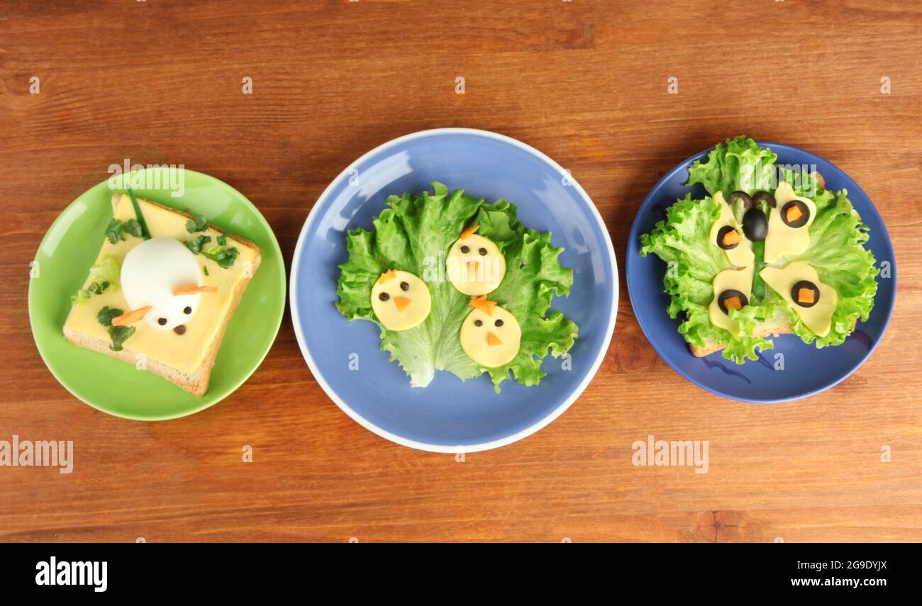 fun food for kids on wooden background Stock Photo - Alamy