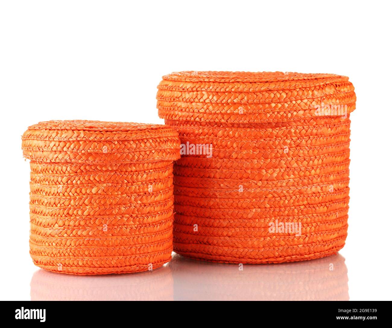 Wicker color boxes isolated on white Stock Photo - Alamy