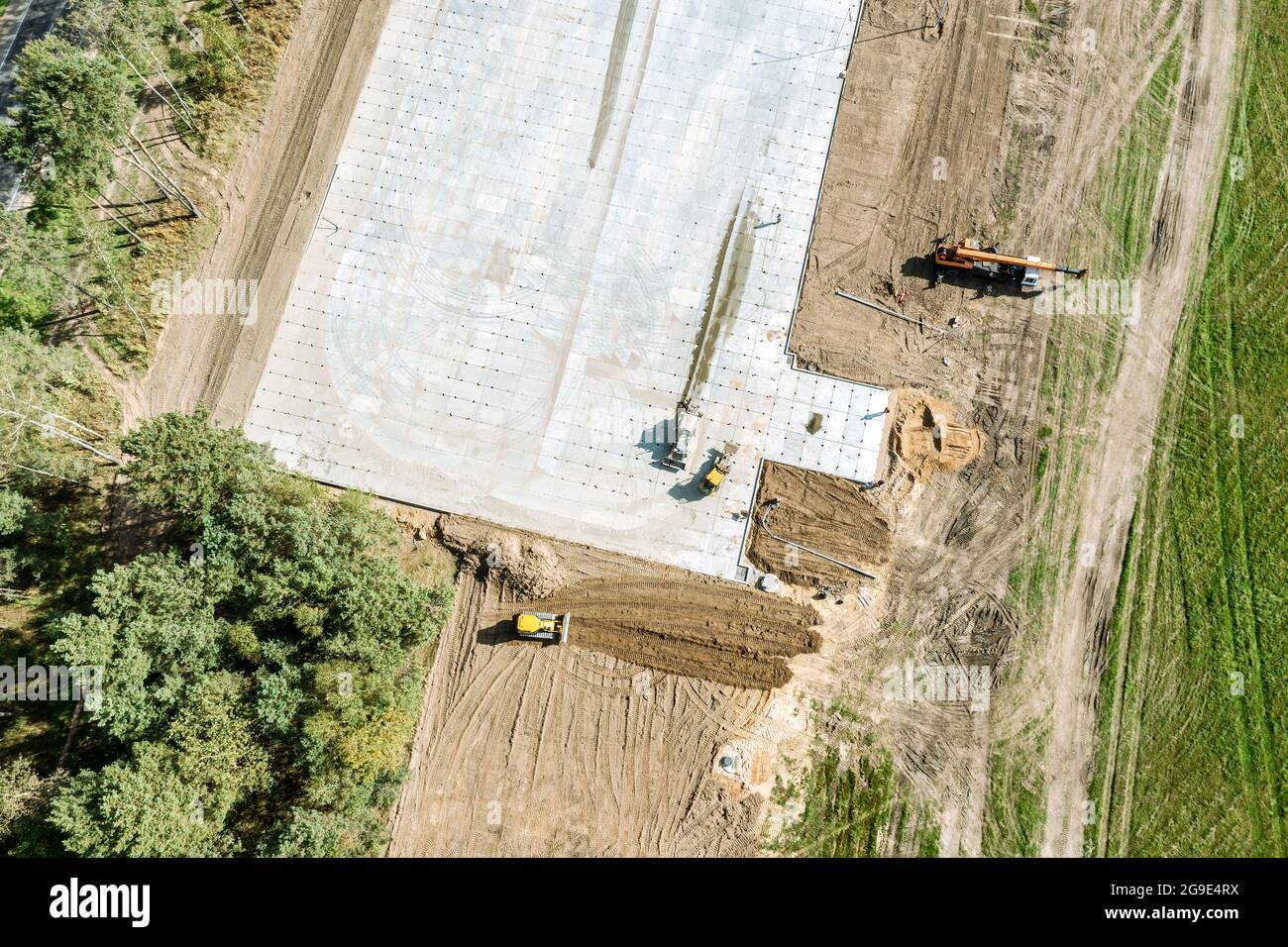 outdoor parking lot in suburban neighborhood under construction. aerial ...