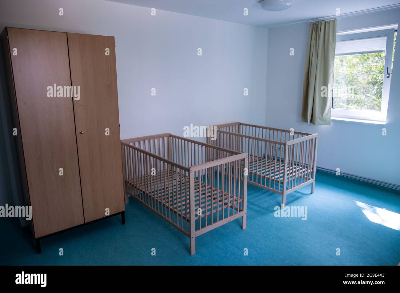 Stralsund, Germany. 20th July, 2021. Two empty cots for small children ...