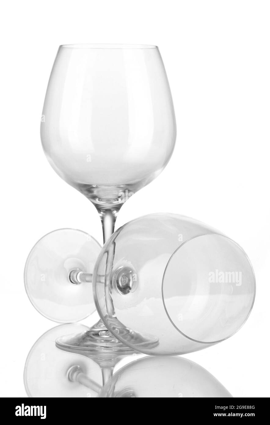Two empty wine glasses isolated on white Stock Photo - Alamy