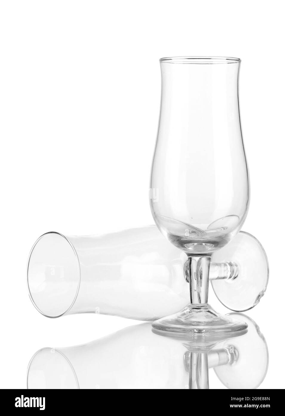 Two empty wine glasses isolated on white Stock Photo - Alamy