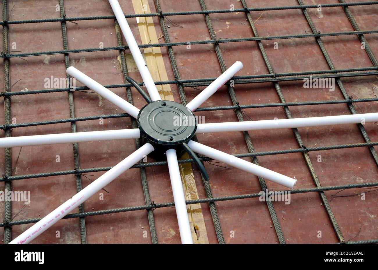 Electric fixture installation during flat construction Stock Photo - Alamy