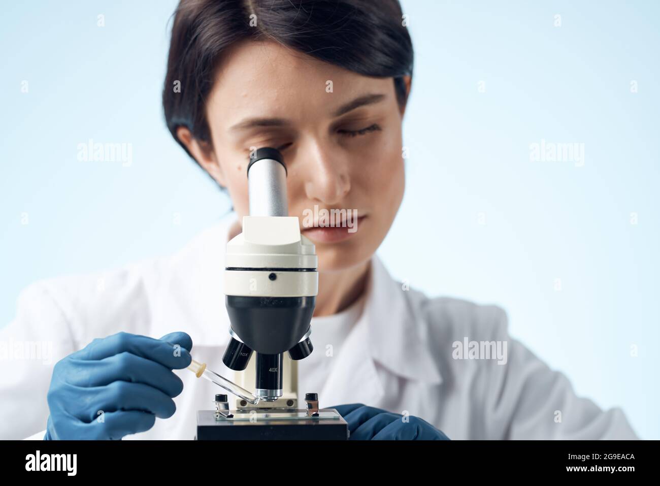 woman laboratory assistant microscope diagnostics research science ...