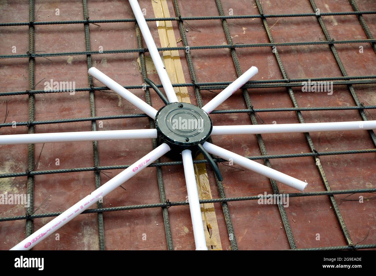 Electric fixture installation during flat construction Stock Photo - Alamy