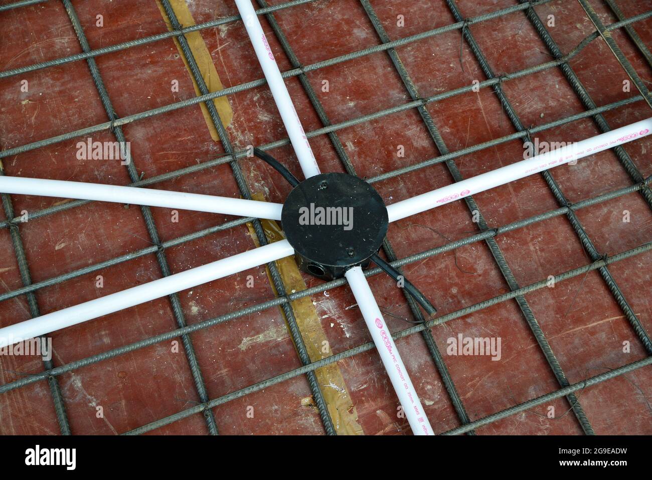 Electric fixture installation during flat construction Stock Photo - Alamy