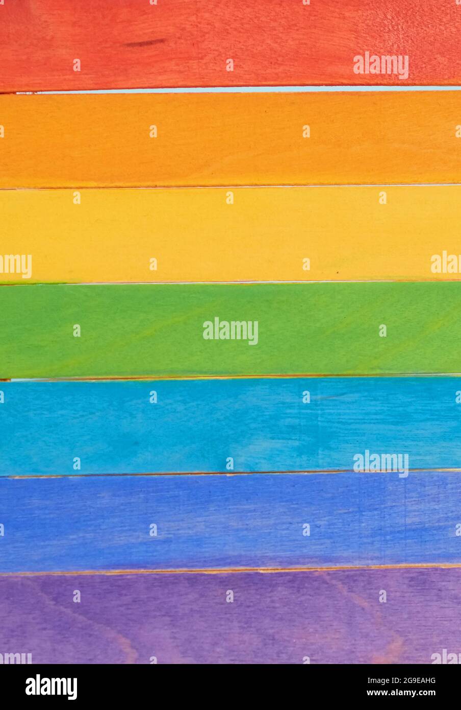 To-do list. Seven wooden blocks painted in the colors of the rainbow ...
