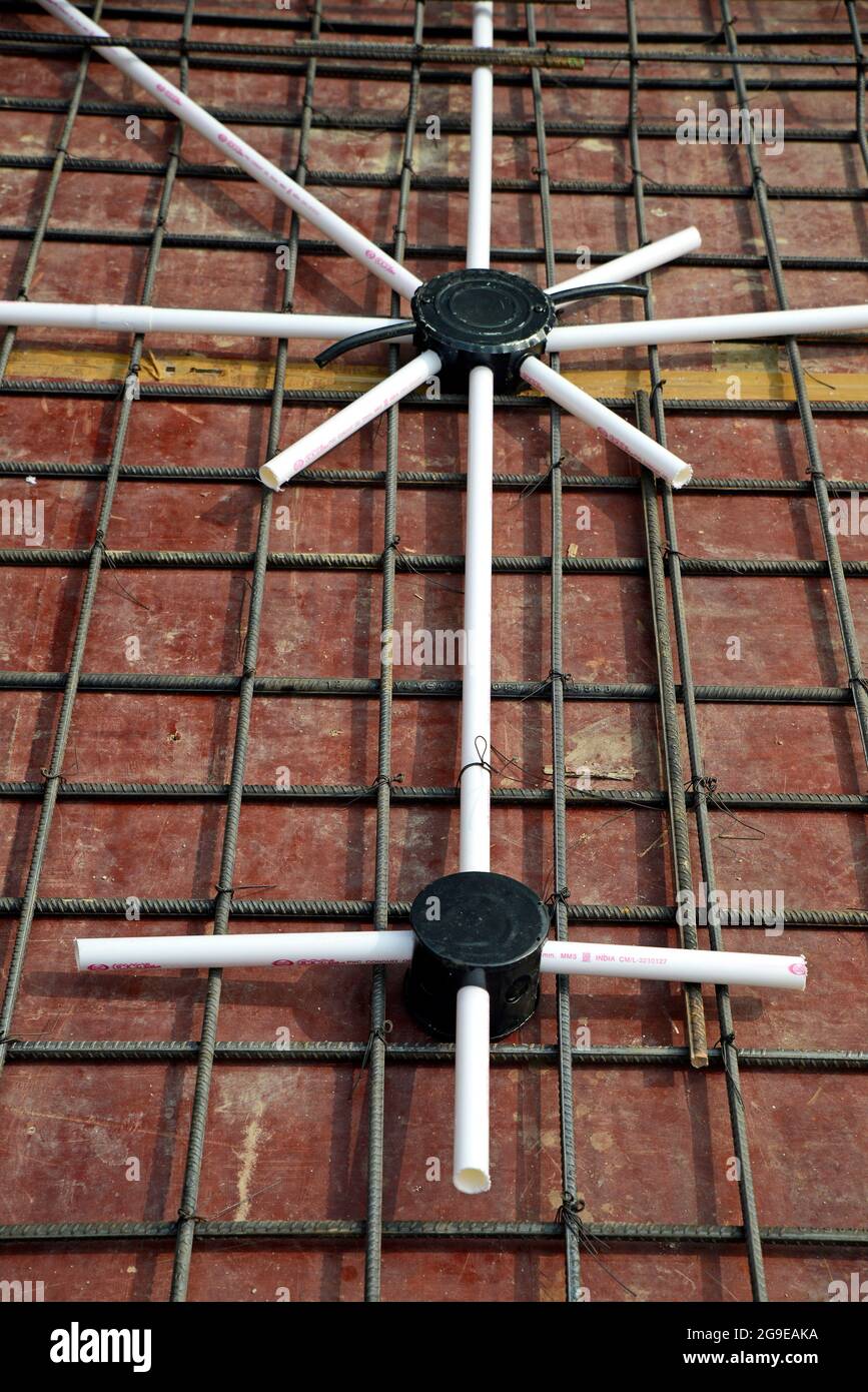 Electric fixture installation during flat construction Stock Photo - Alamy