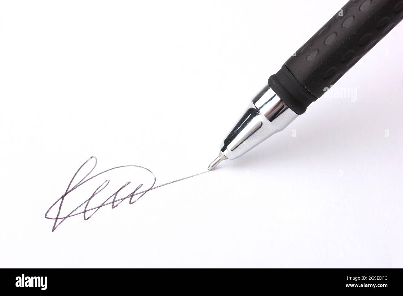 Closeup of signature (fake, not real) and pen, isolated on white Stock ...