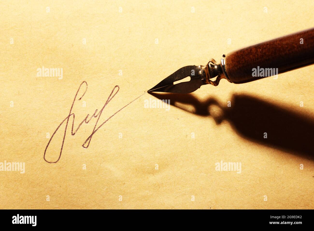 Closeup of signature (fake, not real) and ink pen, on old paper Stock ...